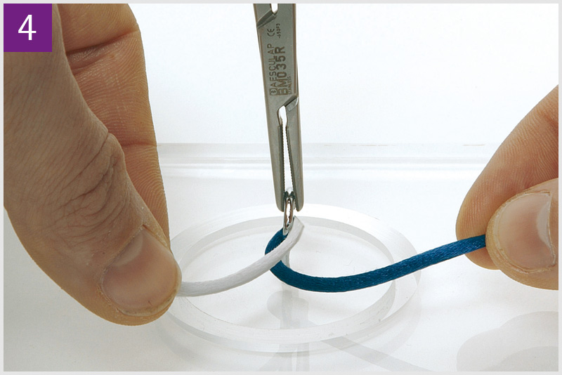 Ligation around haemostatic clamp (Alternate technique)