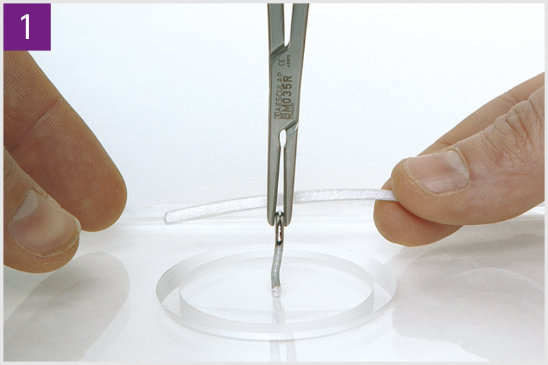 Ligation around haemostatic clamp (Common technique)