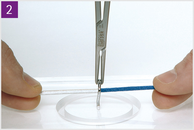 Ligation around haemostatic clamp (Common technique)